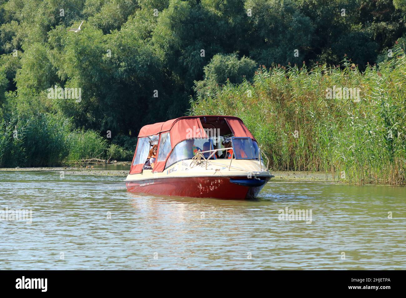Boat for tourists in Danube Delta in Romania Stock Photo - Alamy
