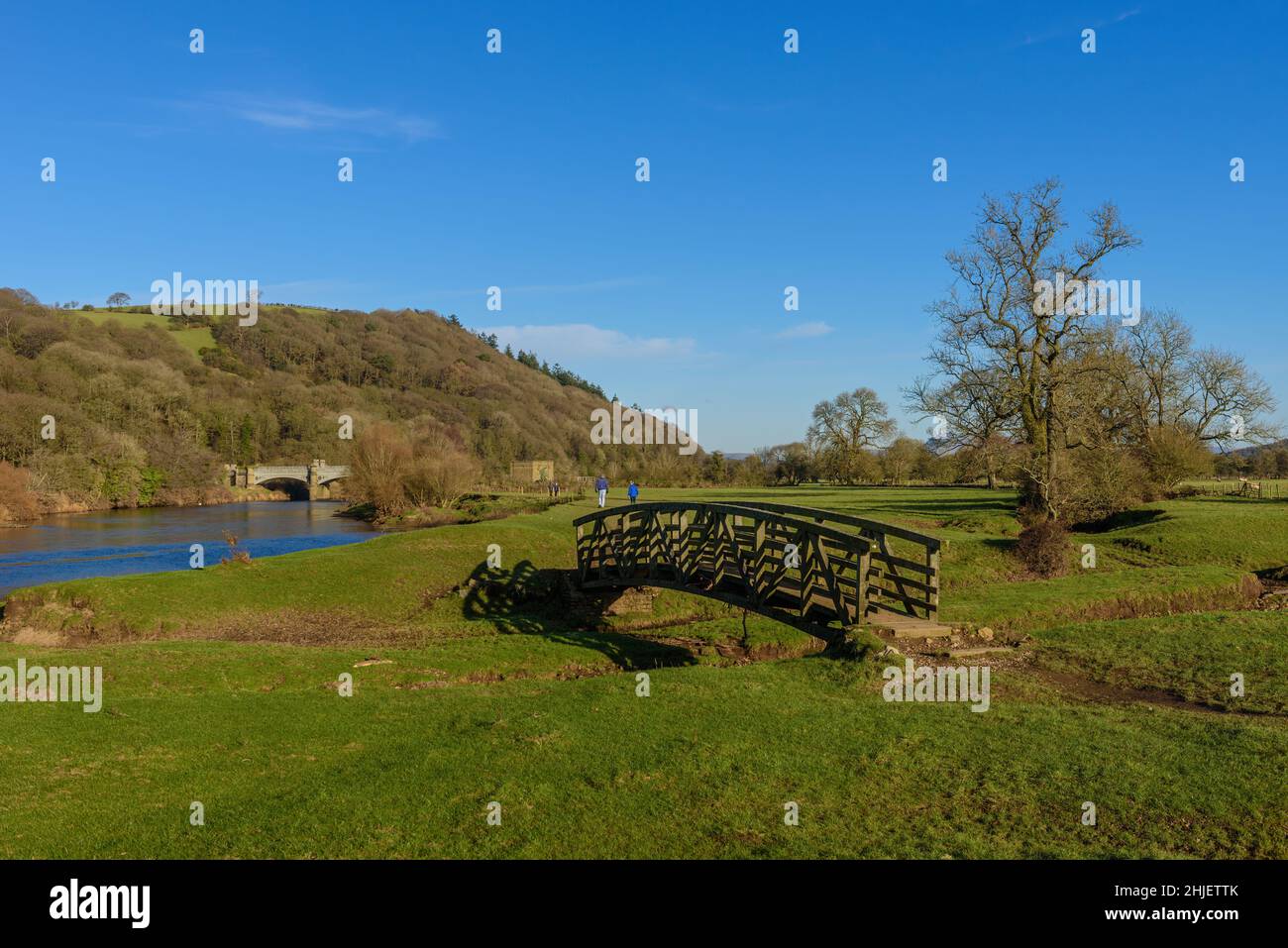 Footbridge over The Artle Beck as it joins The River lune near Caton in ...