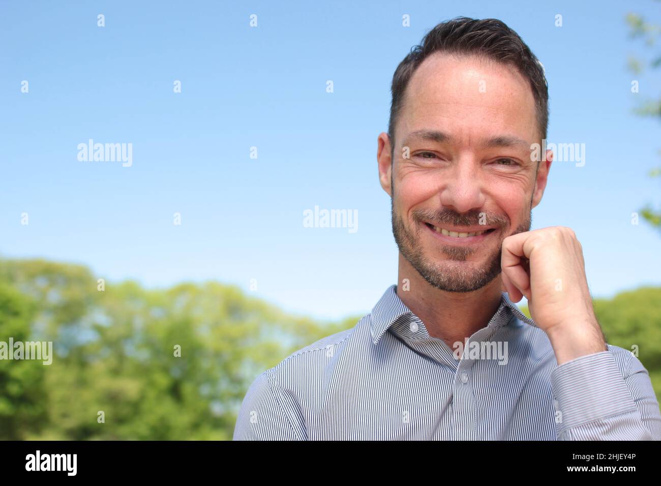 Beautiful commercial man outside Stock Photo - Alamy
