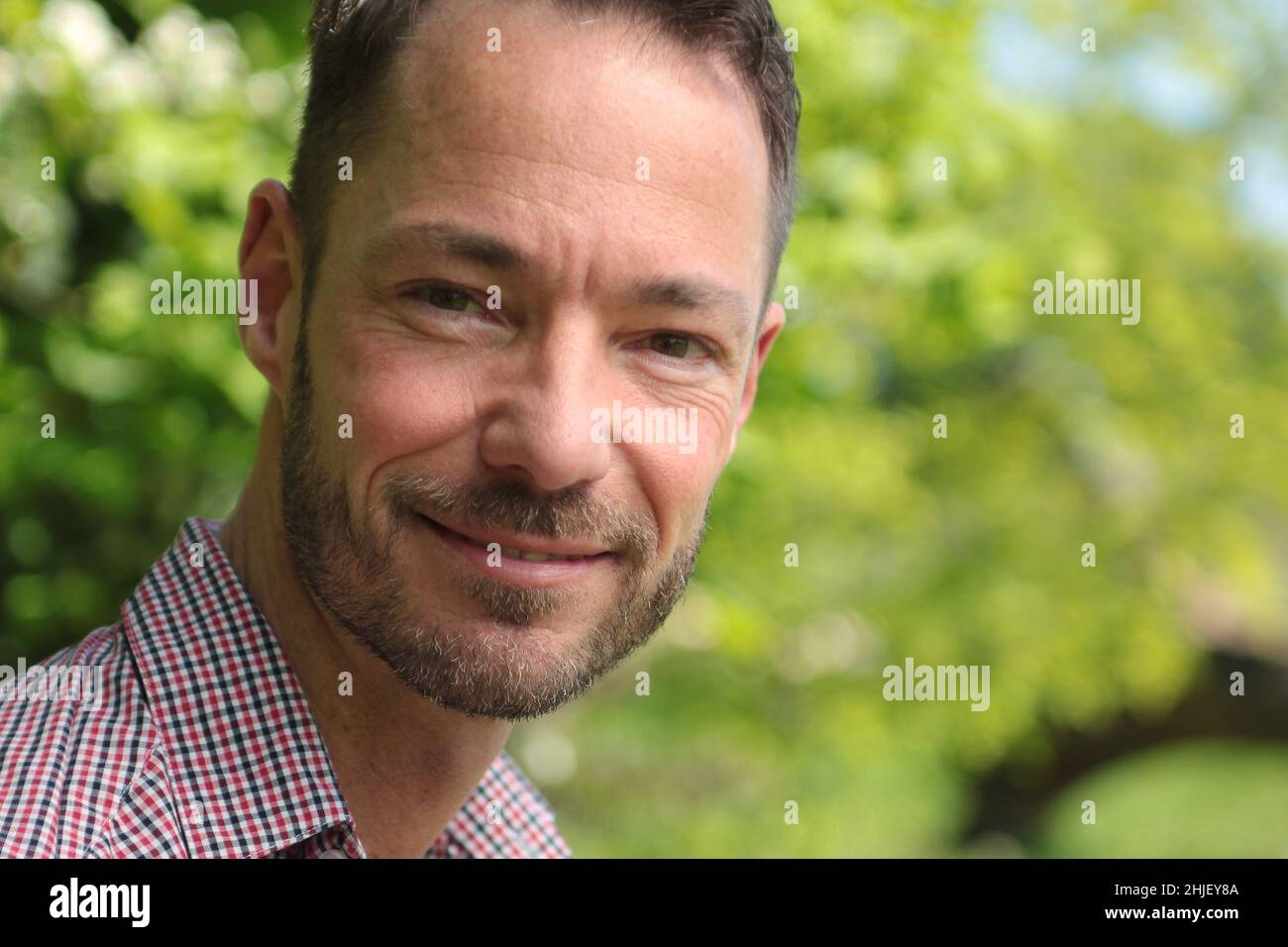 Beautiful commercial man outside Stock Photo - Alamy