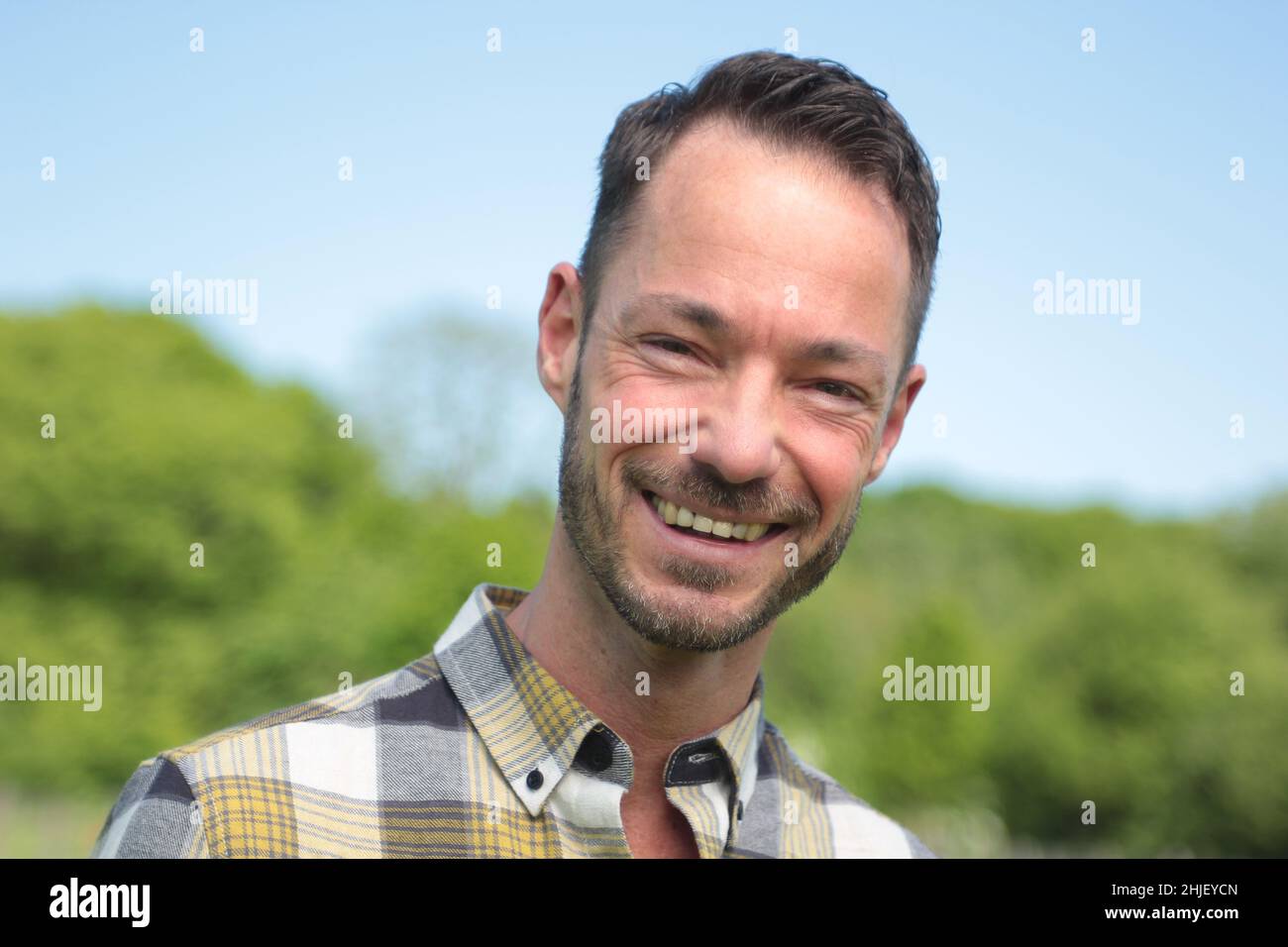 Beautiful commercial man outside Stock Photo - Alamy