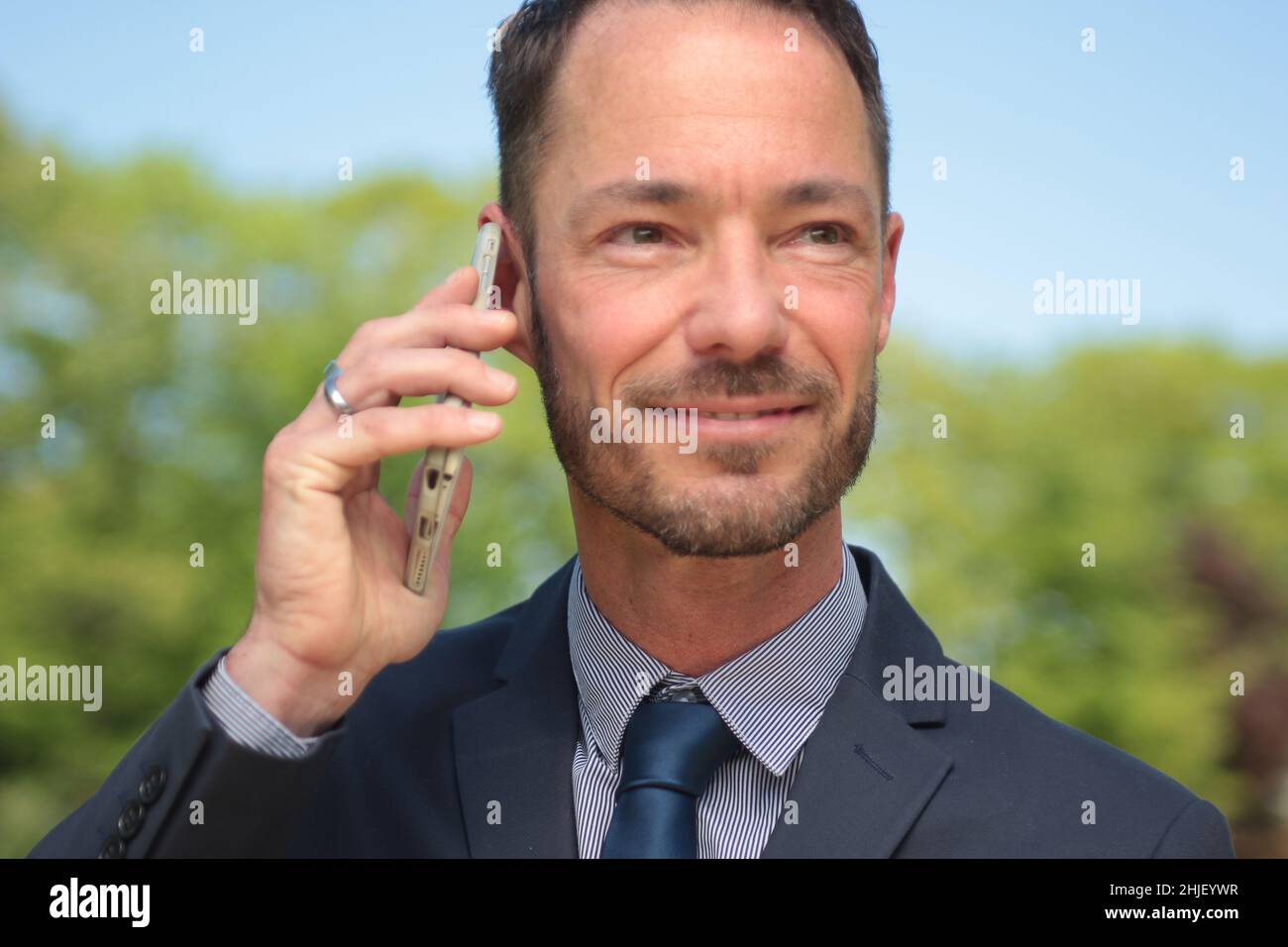 Beautiful commercial man outside Stock Photo - Alamy