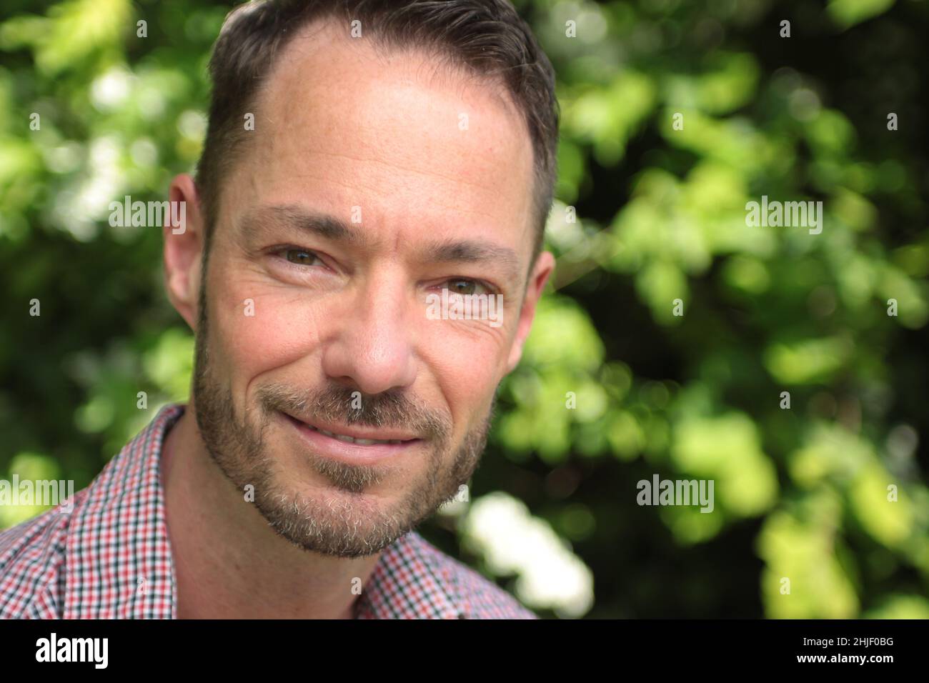 Beautiful commercial man outside Stock Photo - Alamy