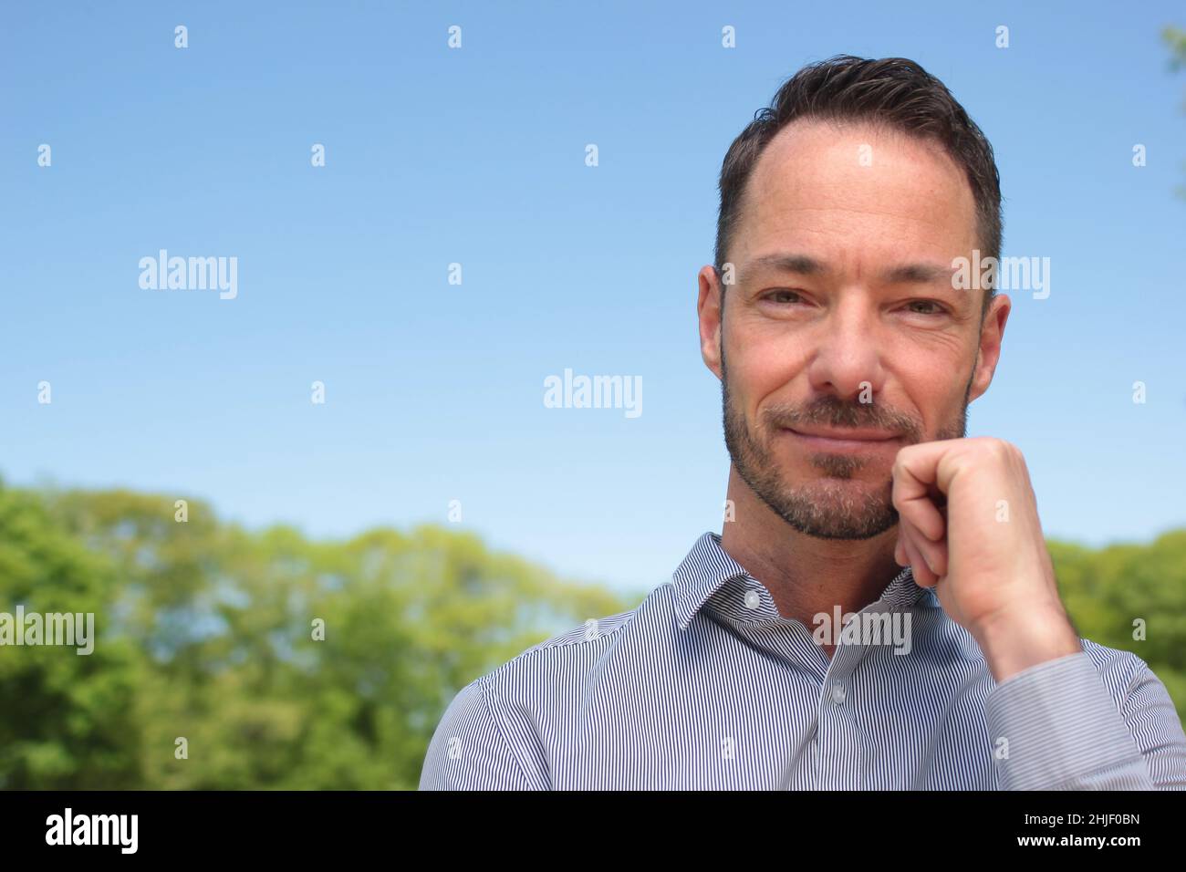Beautiful commercial man outside Stock Photo - Alamy