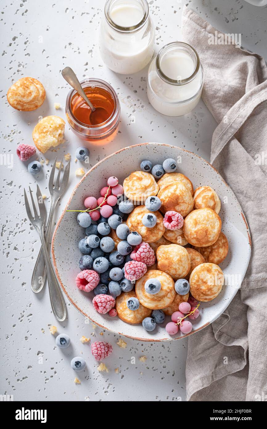 Dutch poffertjes for tasty and fresh breakfast. Breakfast with mini ...