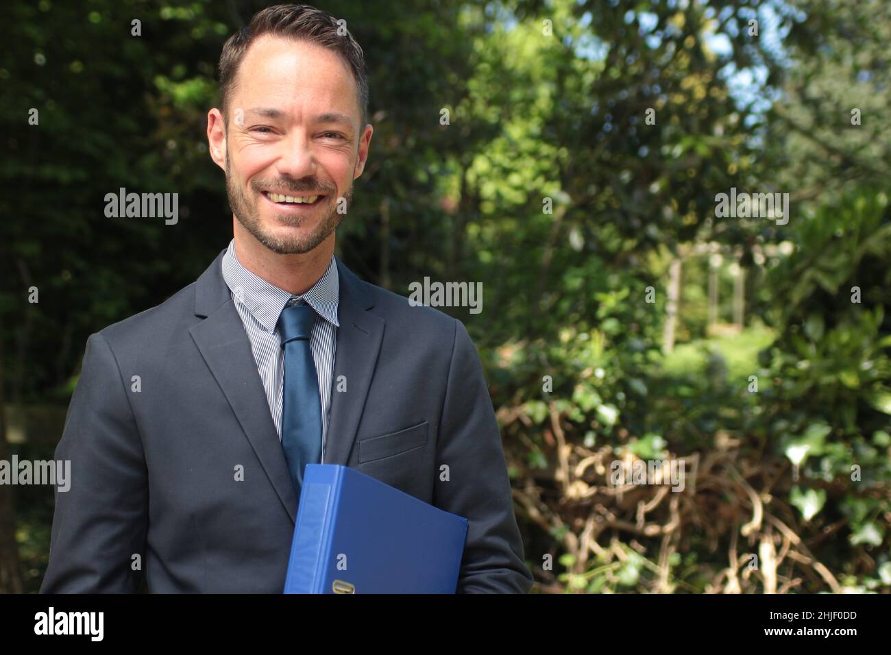 Beautiful commercial man outside Stock Photo - Alamy