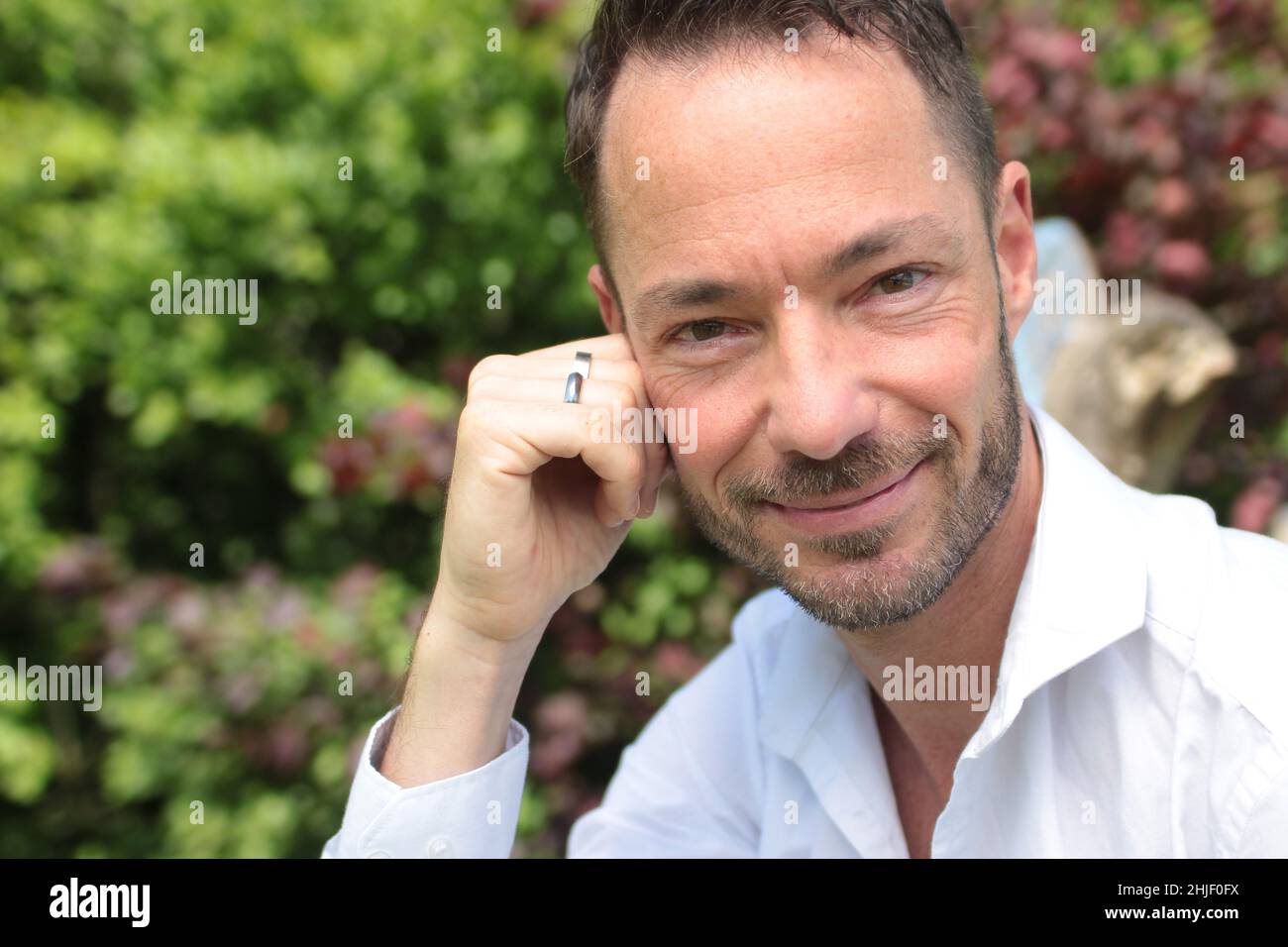 Beautiful commercial man outside Stock Photo - Alamy