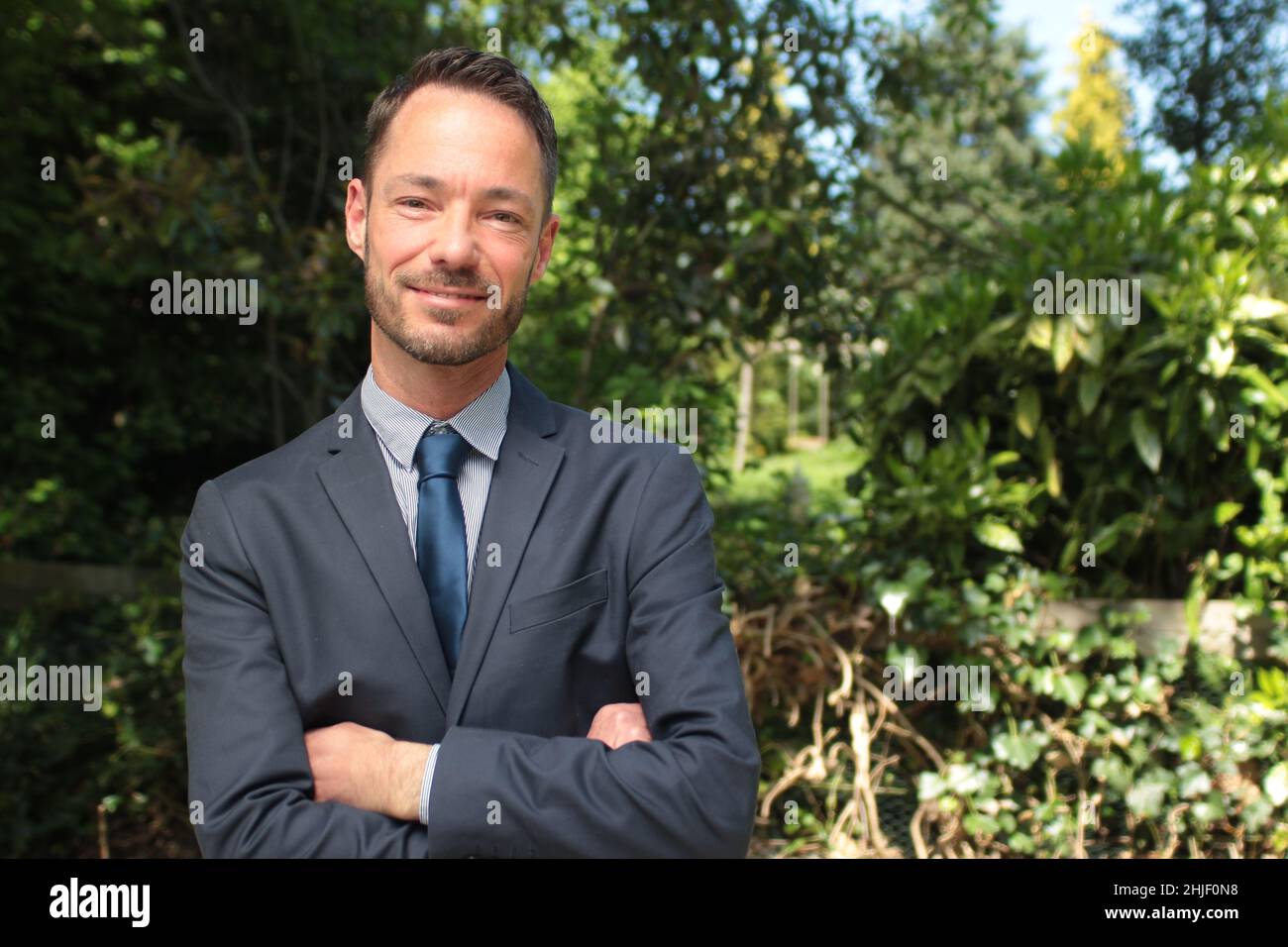 Beautiful commercial man outside Stock Photo - Alamy