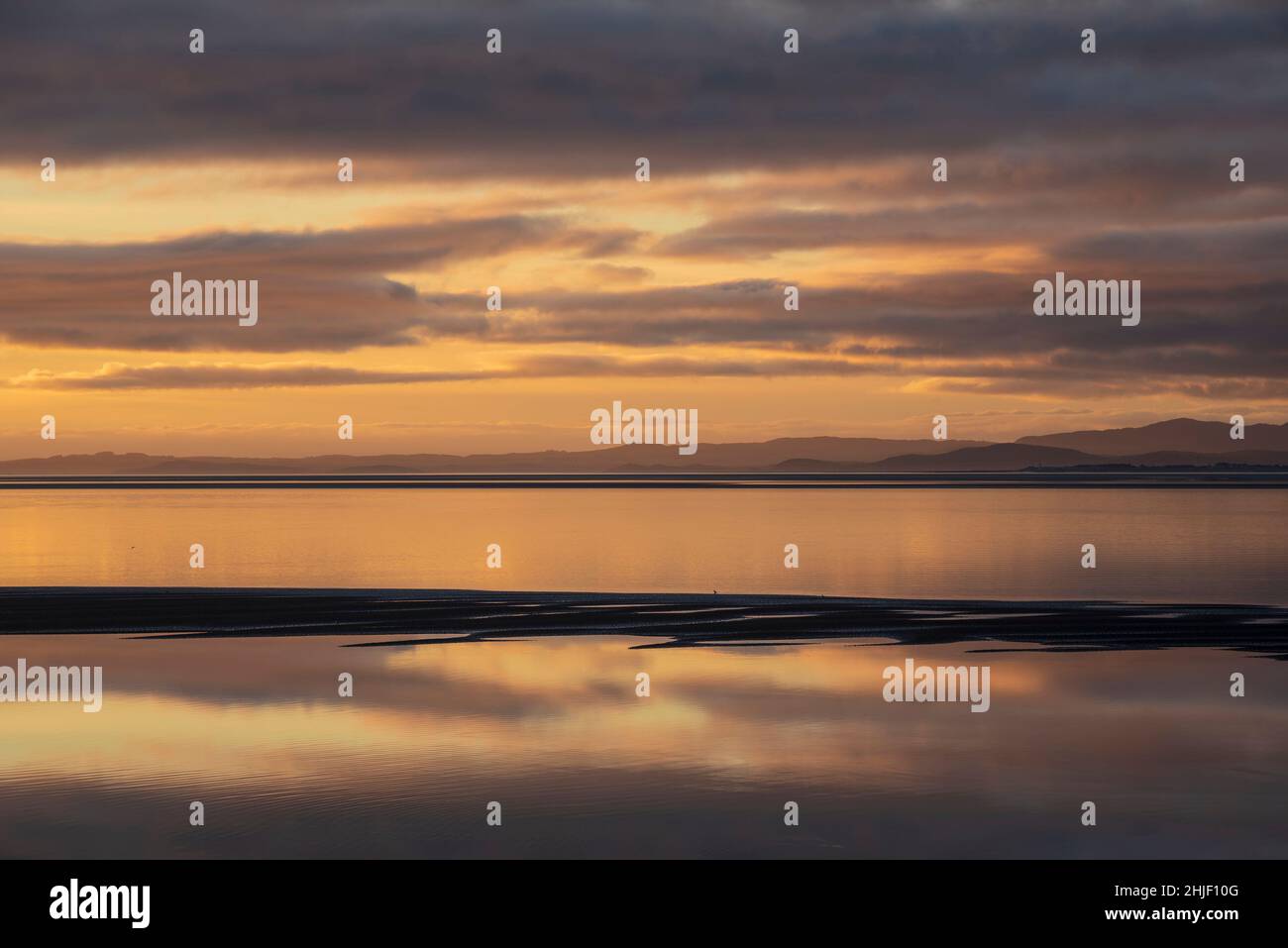 Epic sunset landscape image of Solway Firth viewed from Silloth during ...