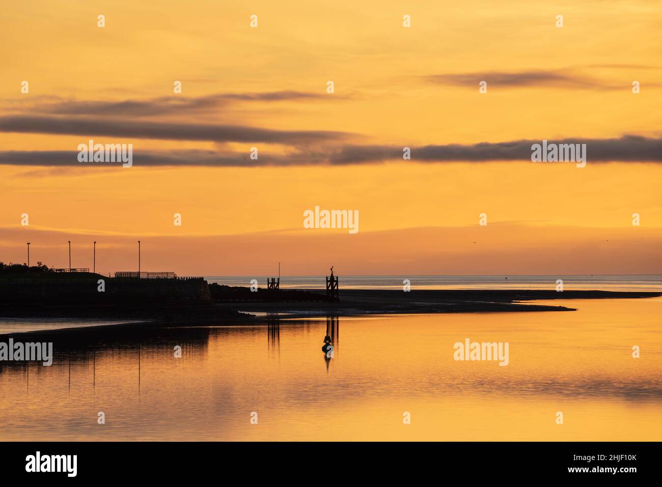 Epic sunset landscape image of Solway Firth viewed from Silloth during ...
