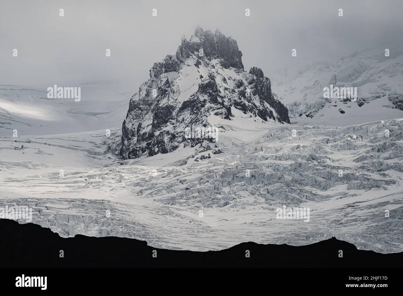 Spectacular glacier and sharp mountain peak in the middle Stock Photo ...