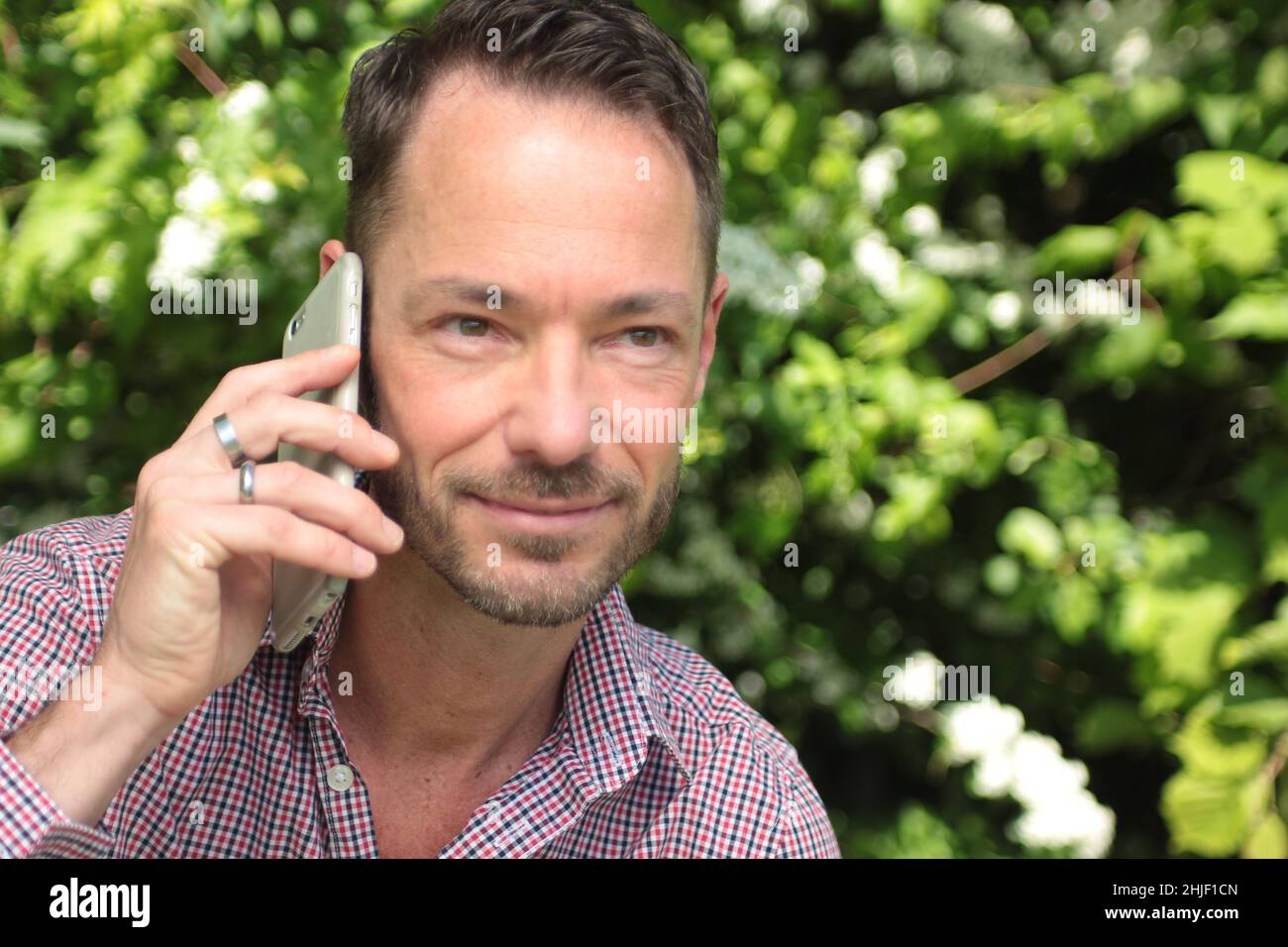 Beautiful commercial man outside Stock Photo - Alamy