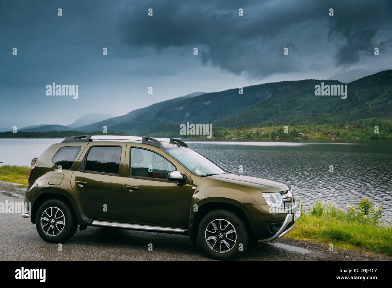 Kroderen, Norway. Car Renault Duster SUV Parked Near Lake Kroderen In ...