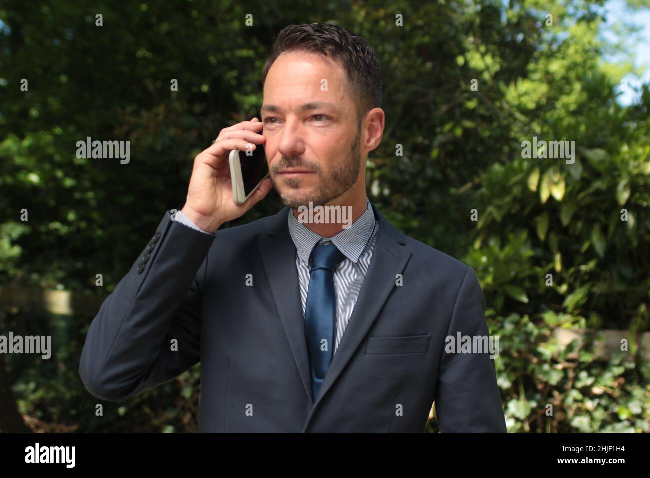 Beautiful commercial man outside Stock Photo - Alamy