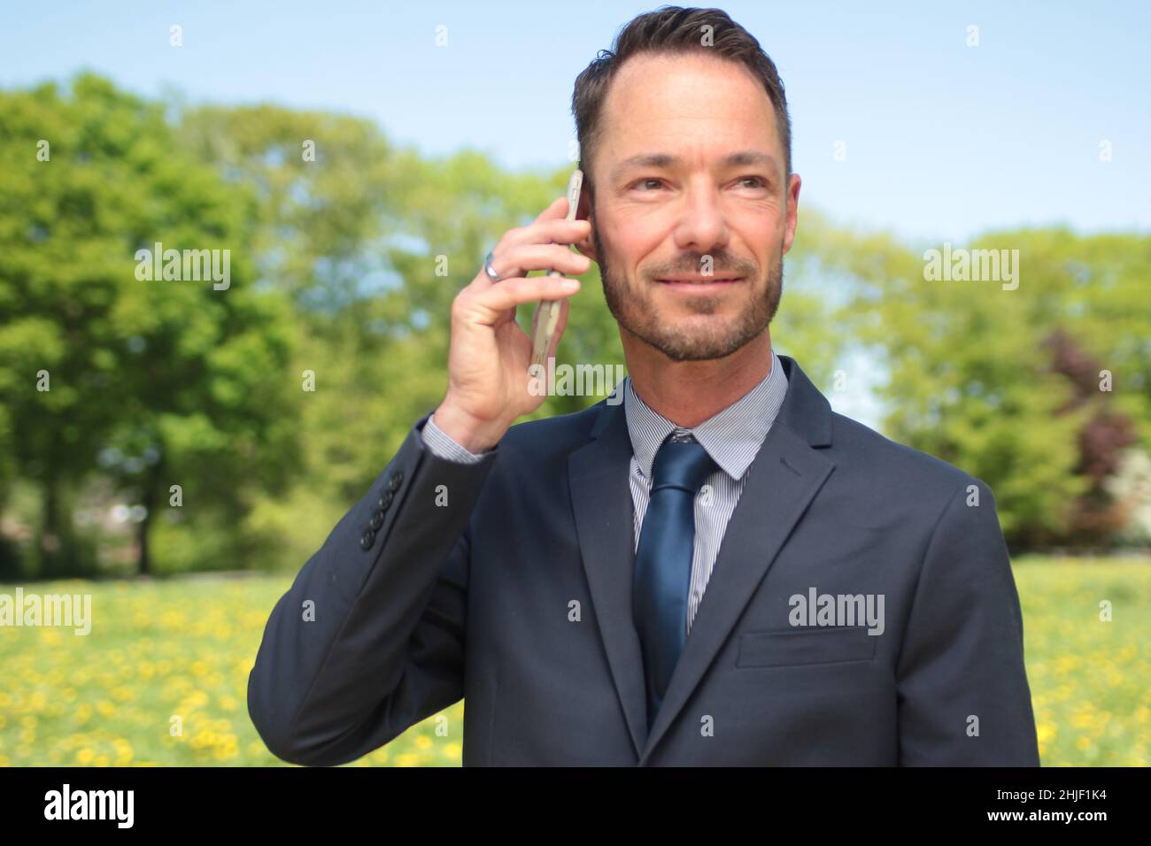 Beautiful commercial man outside Stock Photo - Alamy