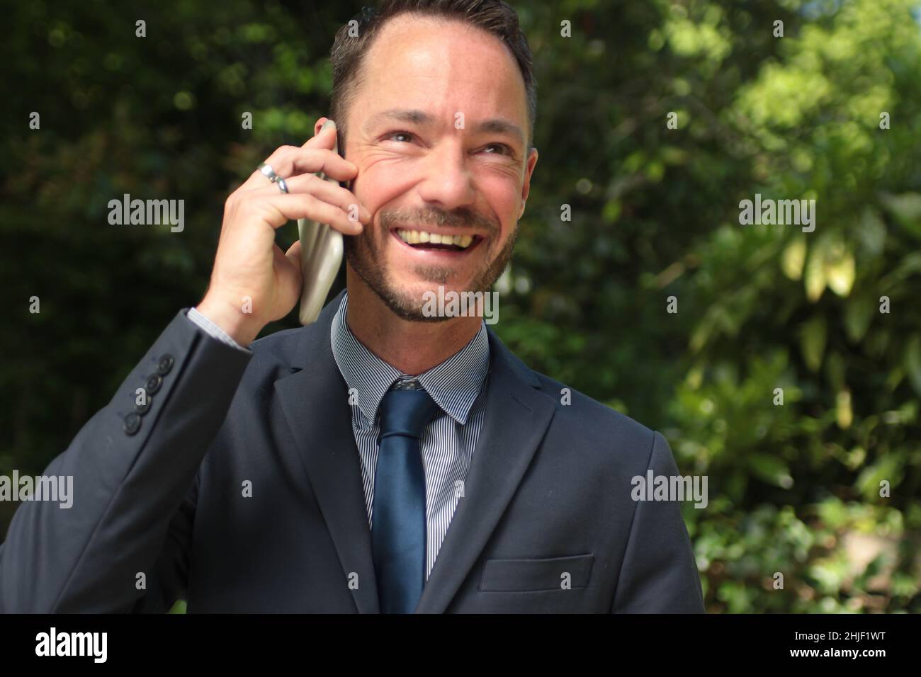 Beautiful commercial man outside Stock Photo - Alamy