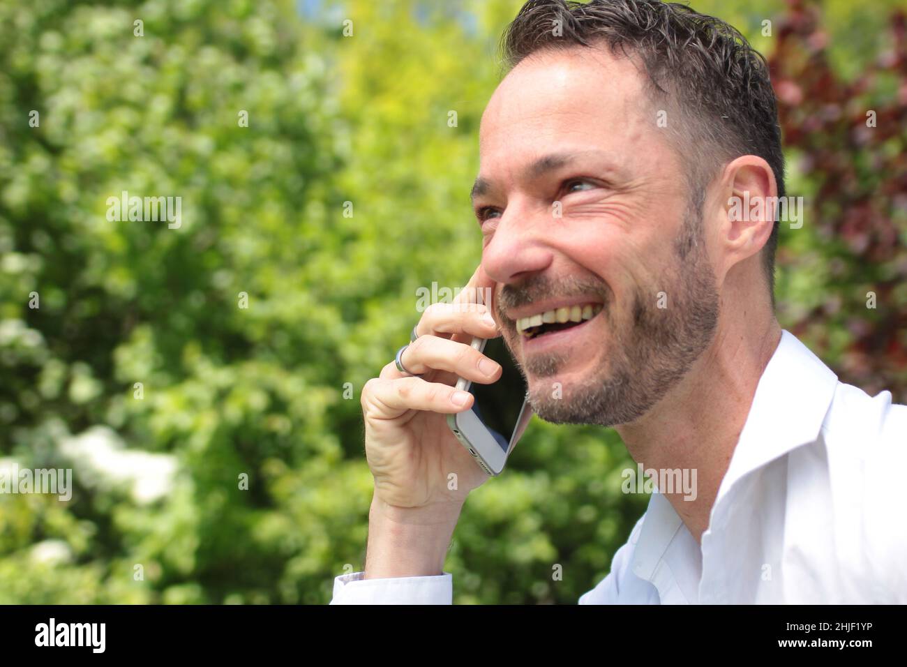 Beautiful commercial man outside Stock Photo - Alamy