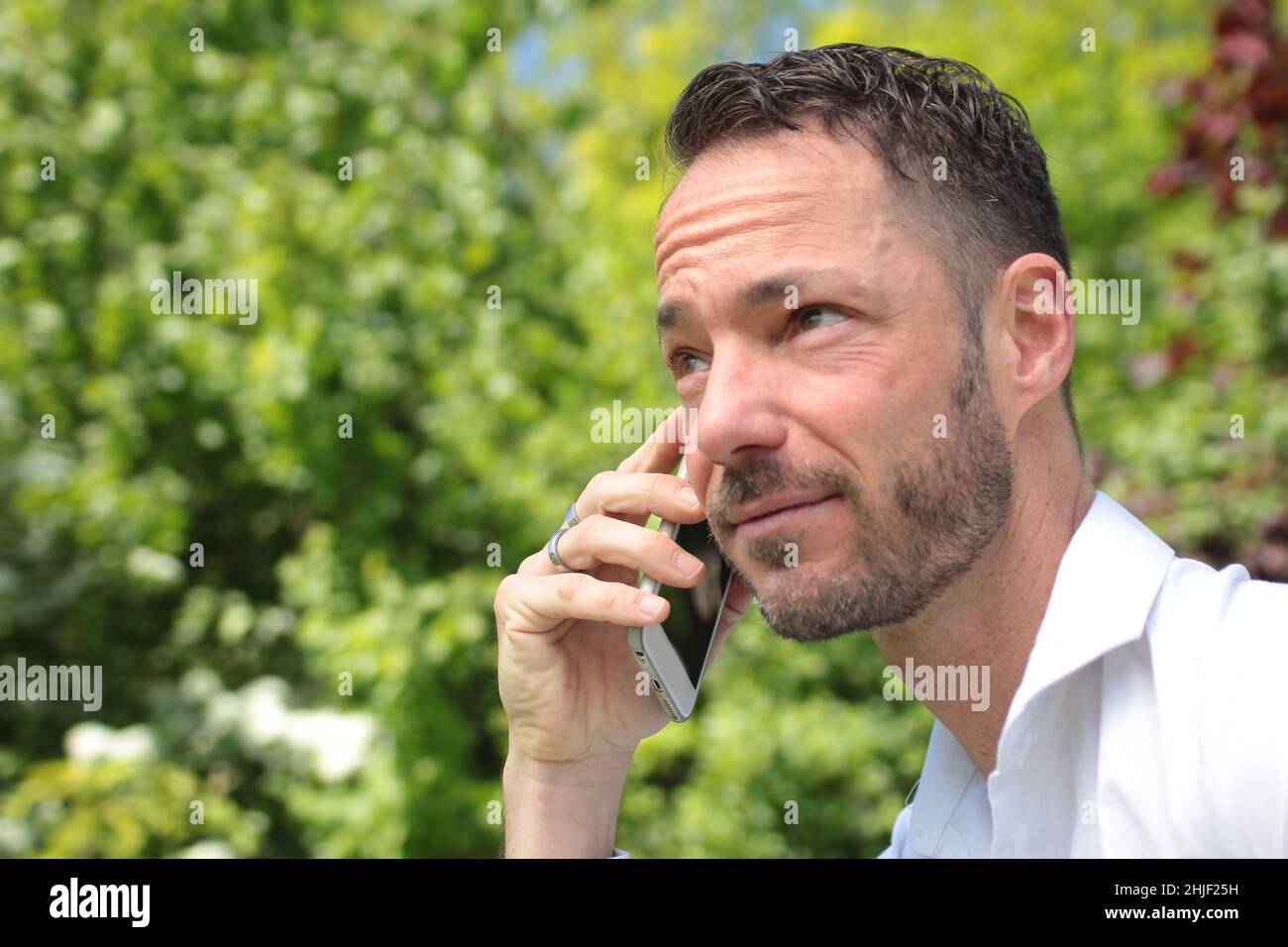 Beautiful commercial man outside Stock Photo - Alamy