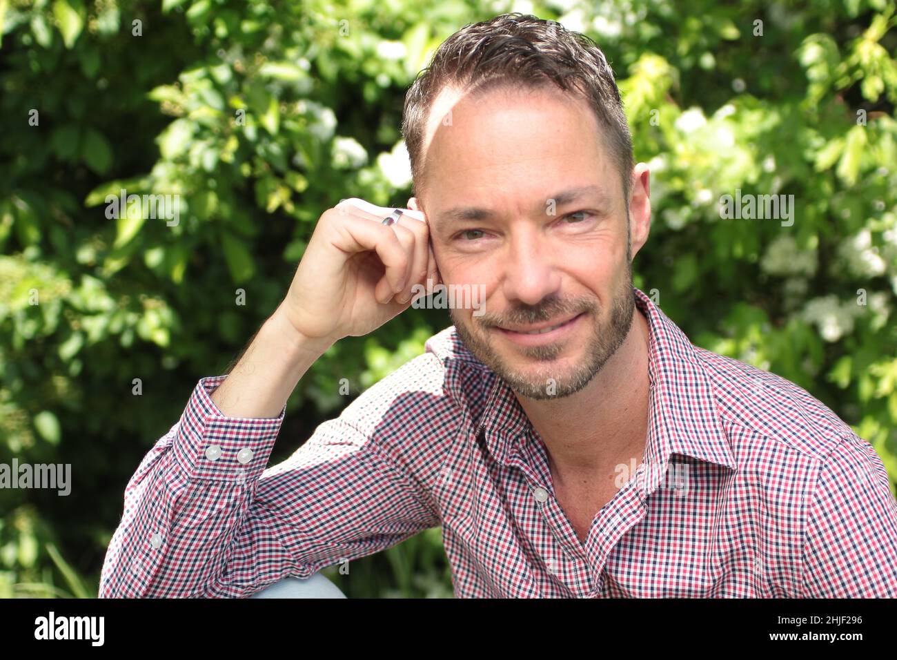 Beautiful commercial man outside Stock Photo - Alamy