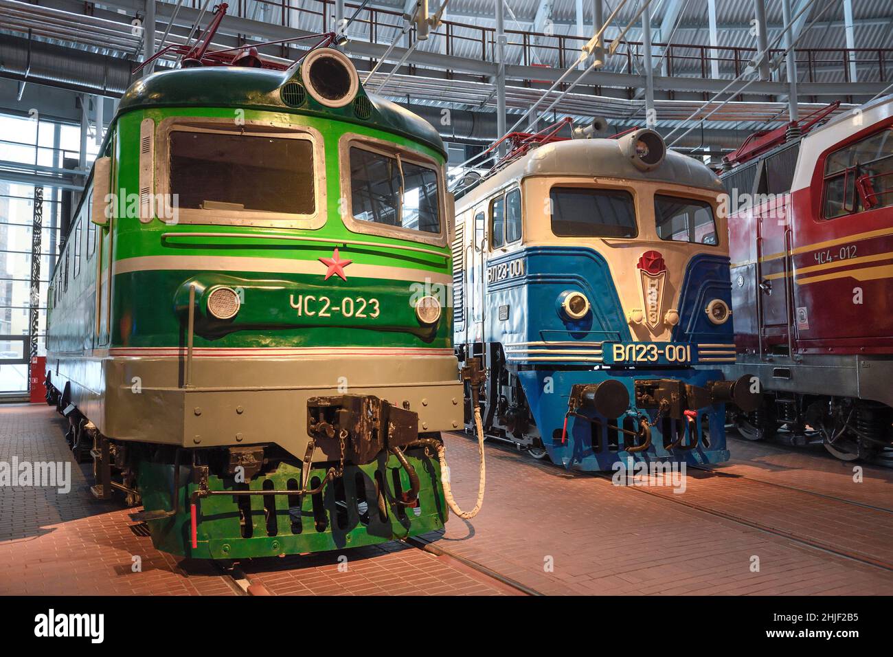 ST. PETERSBURG, RUSSIA - JANUARY 12, 2022: Electric locomotives ChS2 ...