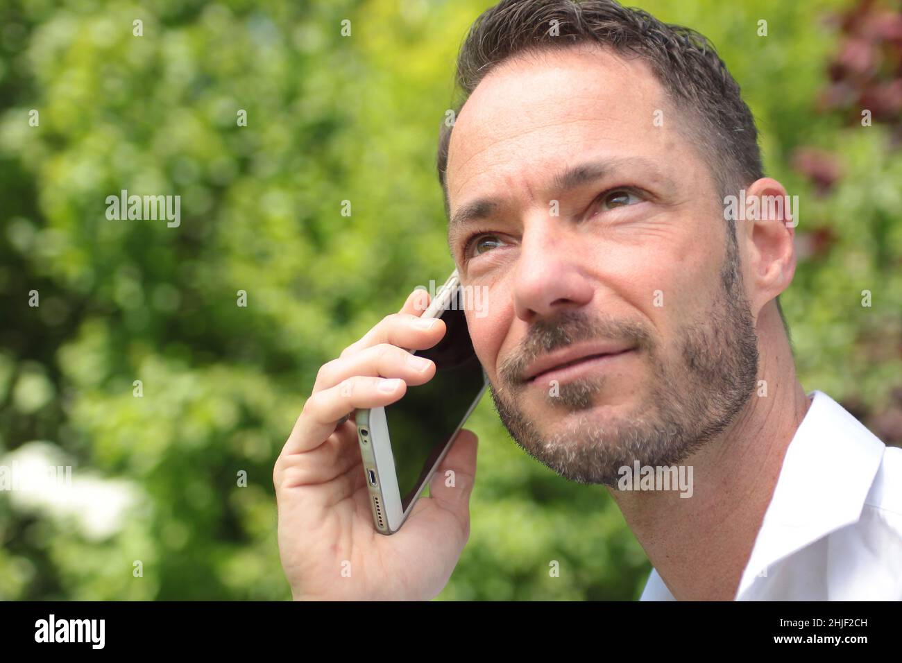 Beautiful commercial man outside Stock Photo - Alamy