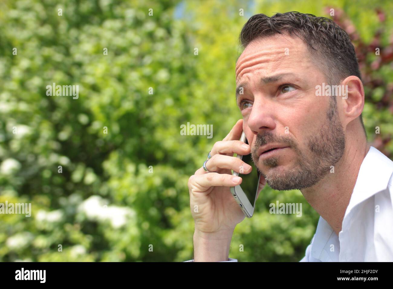 Beautiful commercial man outside Stock Photo - Alamy