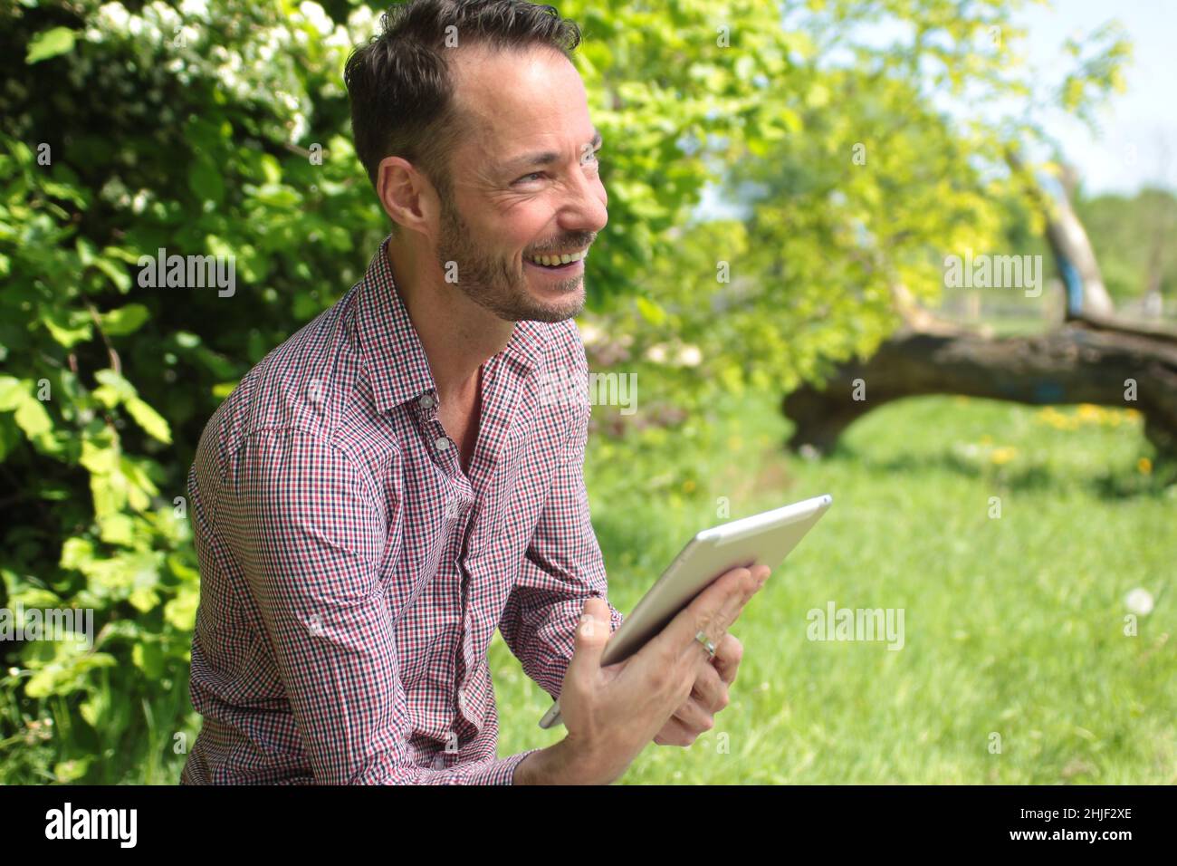 Beautiful commercial man outside Stock Photo - Alamy