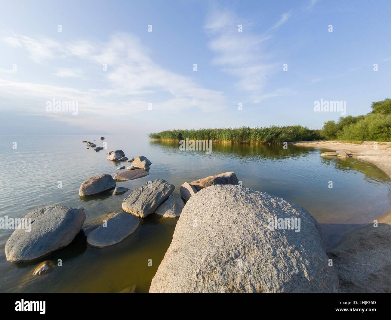 baltic sea coast with sand and rocks at sunny summer day Stock Photo ...