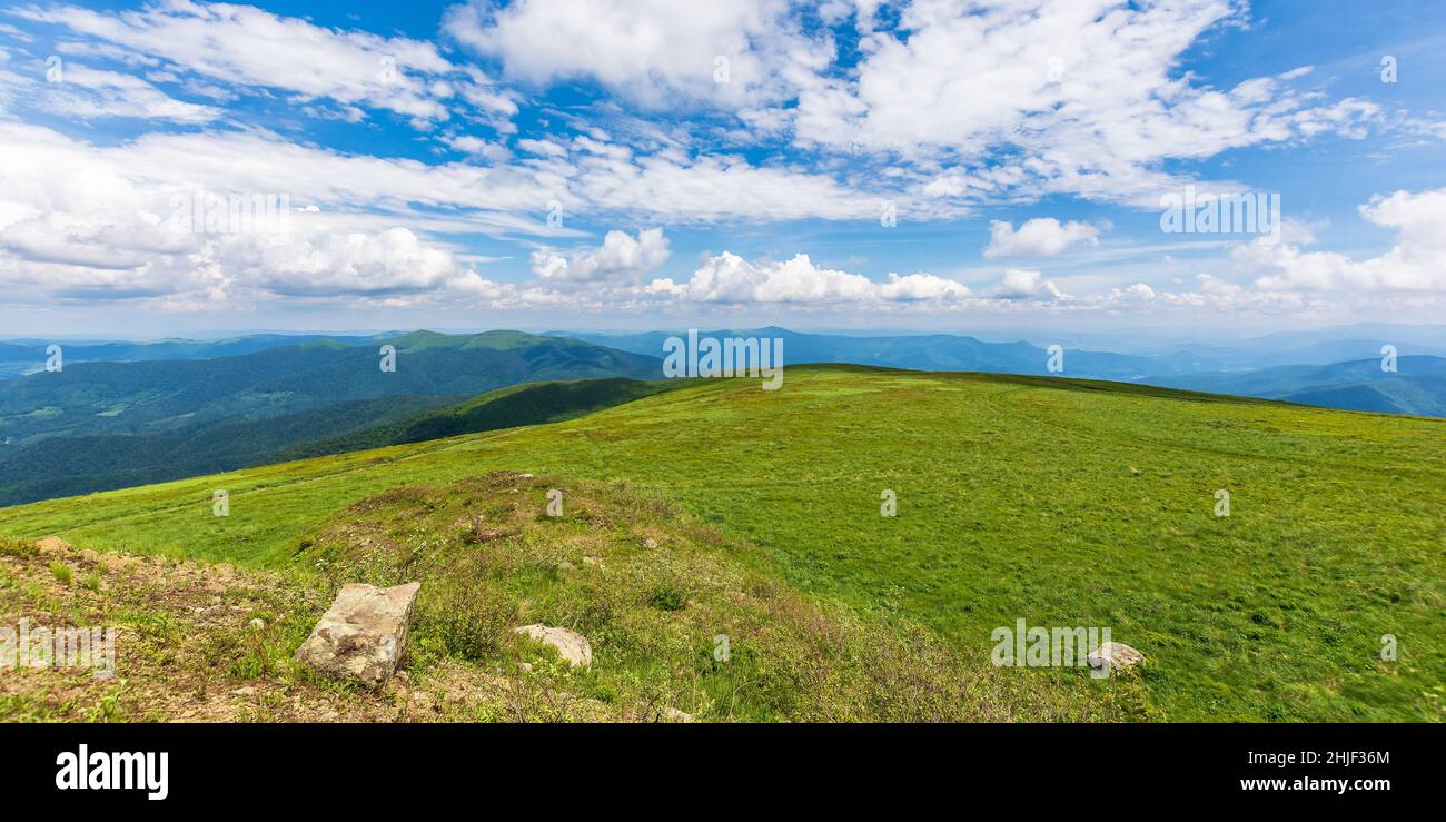 green summer landscape in mountains. outdoor scenery with blue sky and clouds. beautiful nature ...