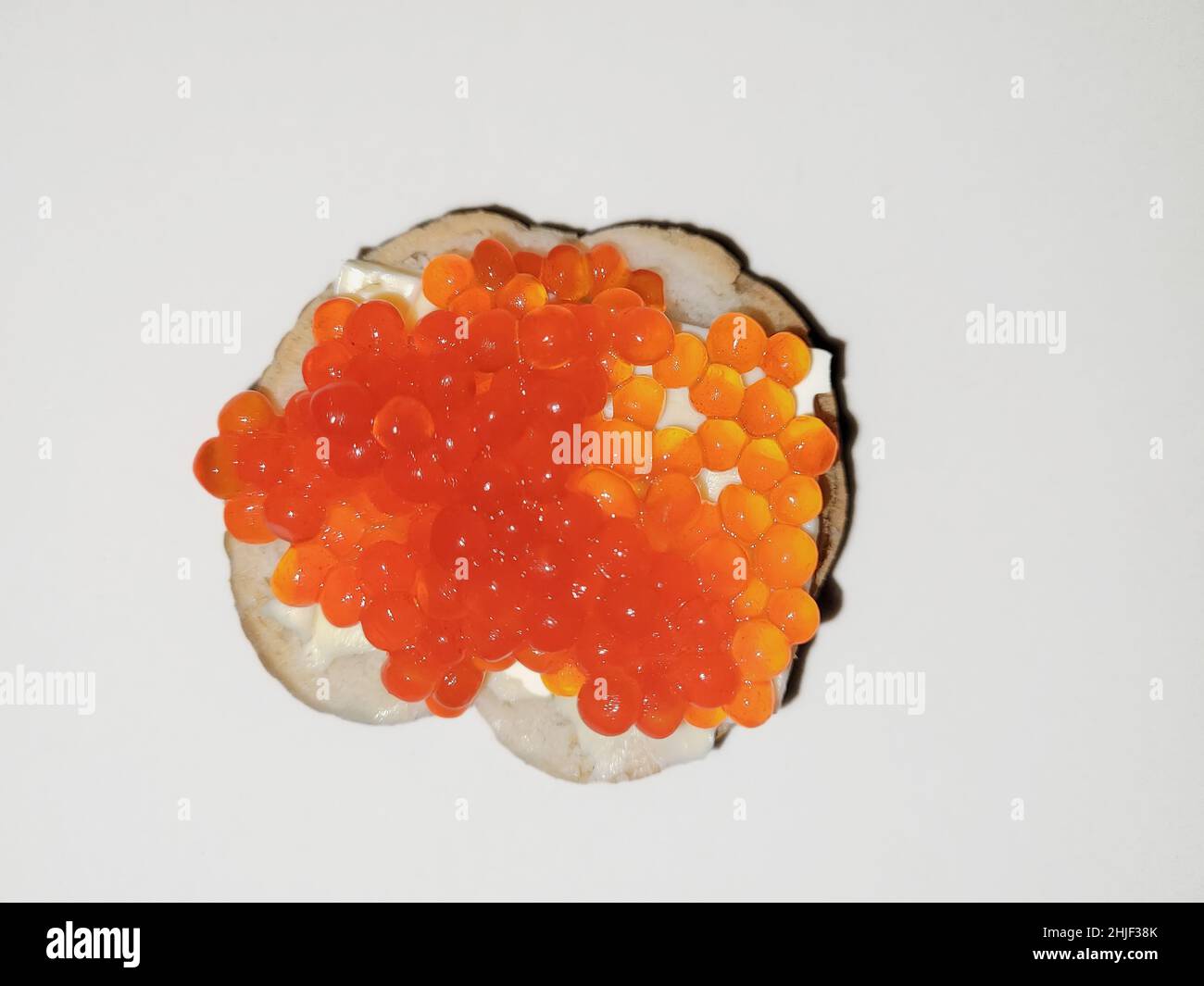 Red caviar sandwich on white background. Macro picture. Top view Stock ...