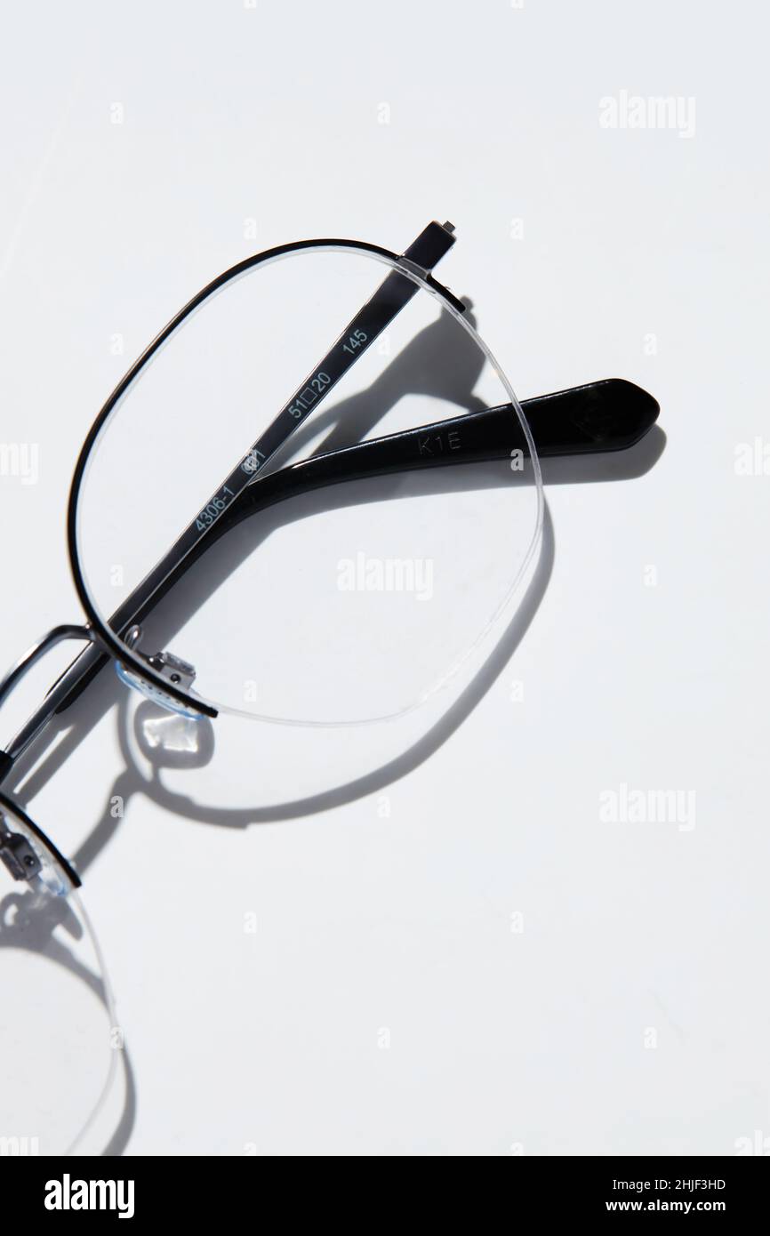 Closeup photo of half rim eyeglasses isolated on white background Stock ...