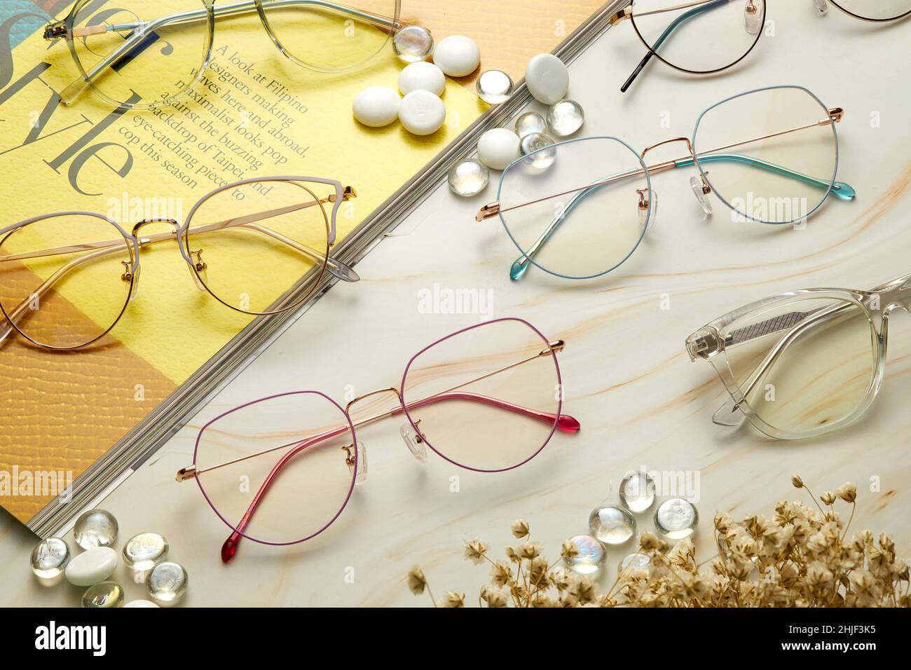Photo of eyeglasses of different frames colors Stock Photo - Alamy