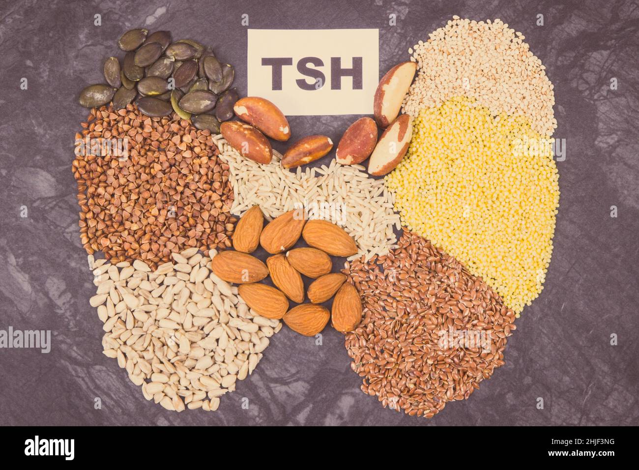 Nutritious natural ingredients in shape of thyroid. Healthy food as ...