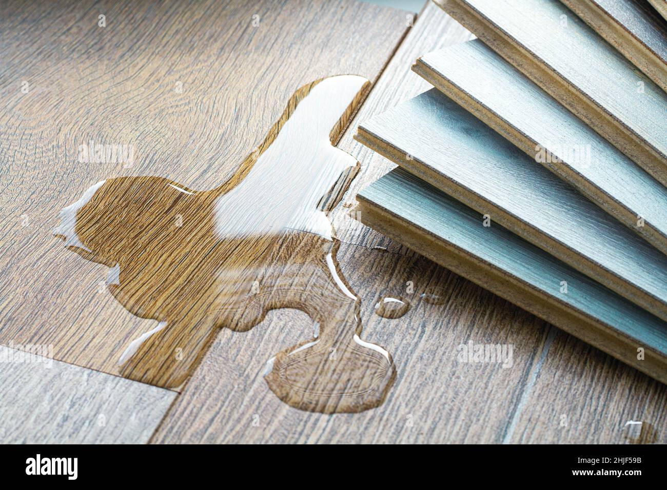 Laminate and water. Waterproof laminate. Wooden floors are impervious ...