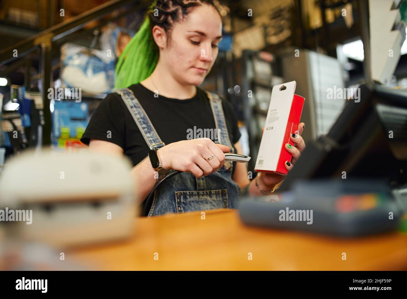 Staff scan barcode on hi-res stock photography and images - Alamy