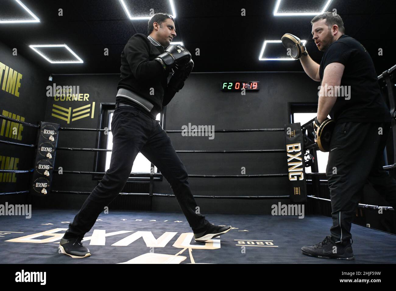 Scottish Labour leader Anas Sarwar (left) spars with owner Paul ...