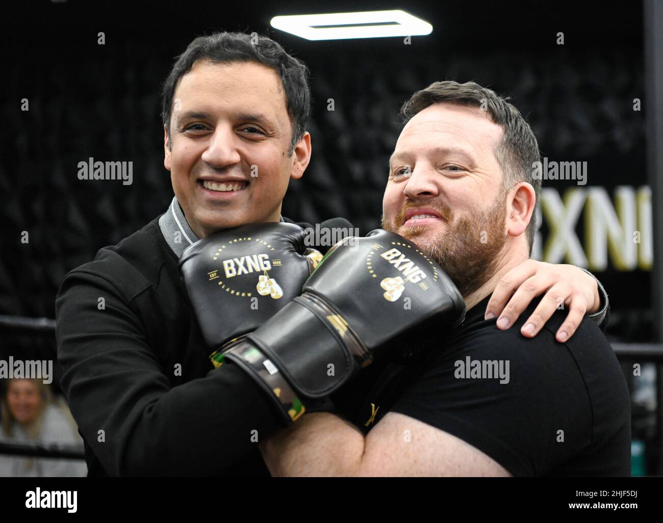 Scottish Labour leader Anas Sarwar (left) spars with owner Paul ...