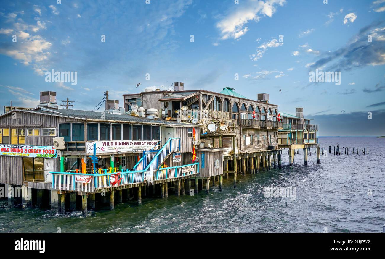 Dock Street restaurants and shops on stilts over water on in Cedar Key ...