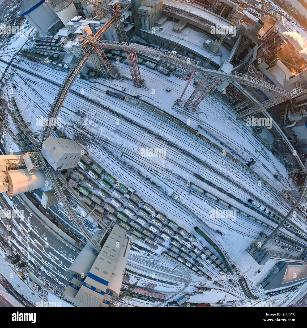 Aerial view of cargo train cars loaded with construction goods at ...