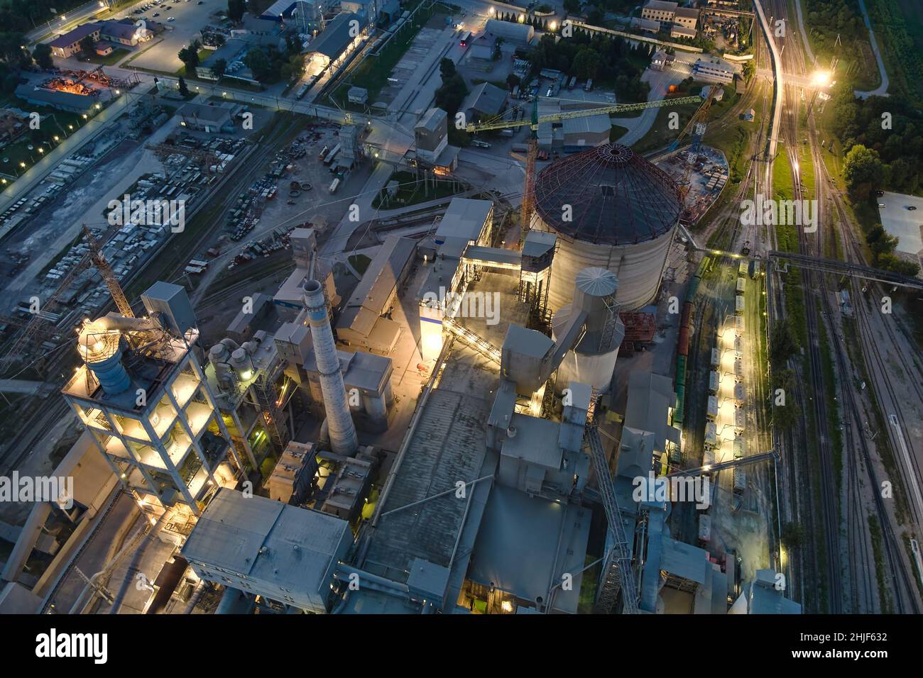 Aerial view of cement factory with high concrete plant structure and ...