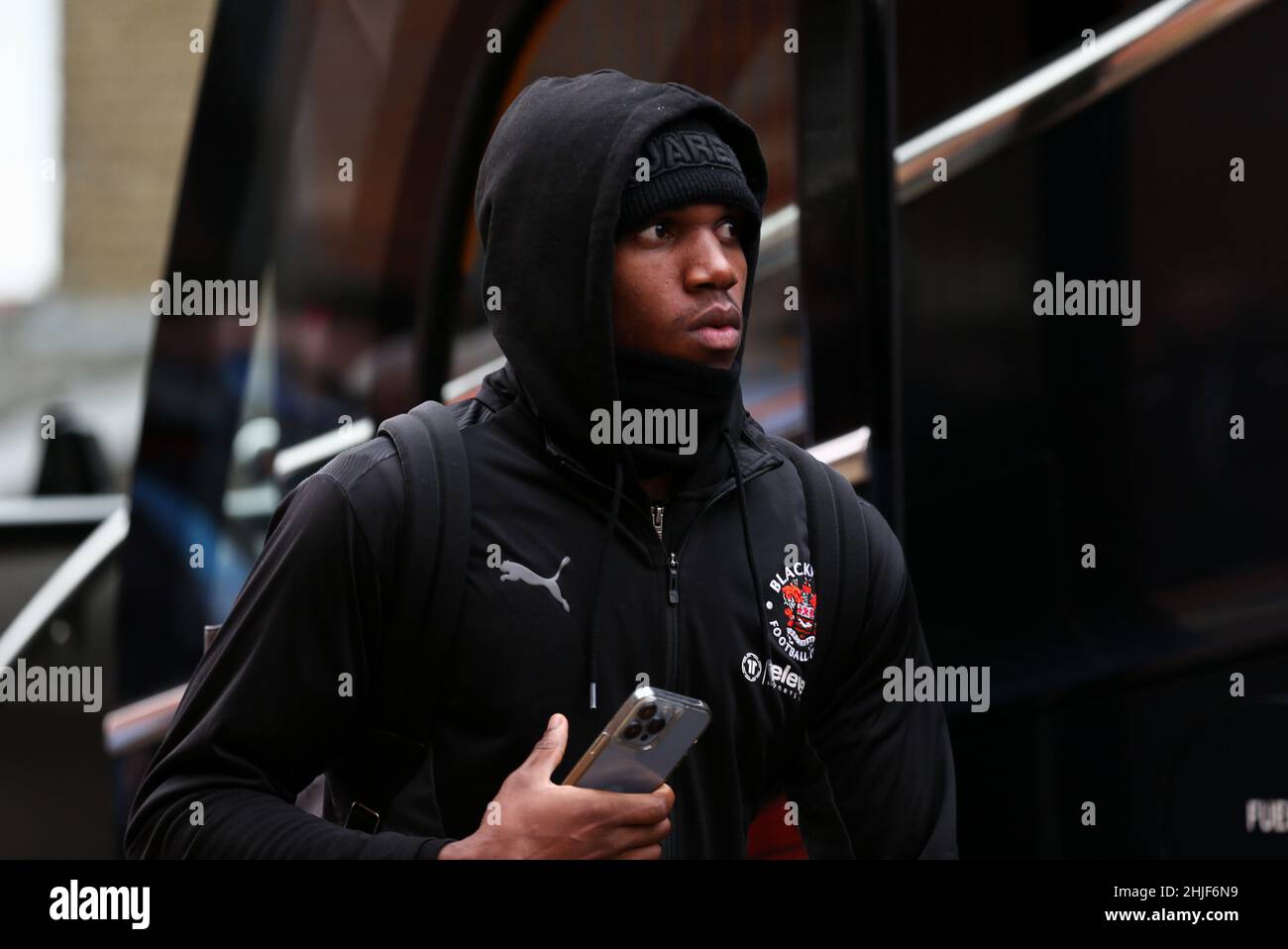 Blackpool players arriving at the stadium Stock Photo - Alamy