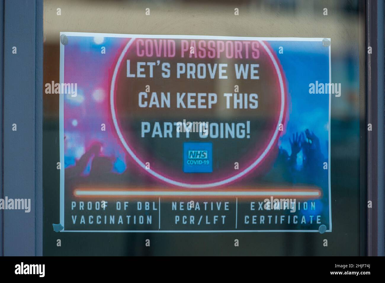 Slough, Berkshire, UK. 29th January, 2022. A Covid-19 Passport sign in ...