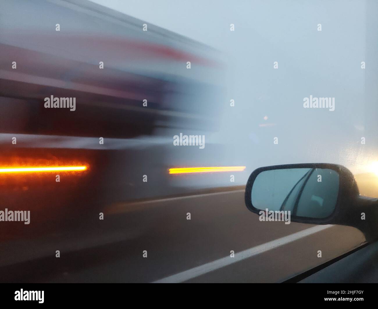 Blurred shot of passing car lights from a car window Stock Photo - Alamy