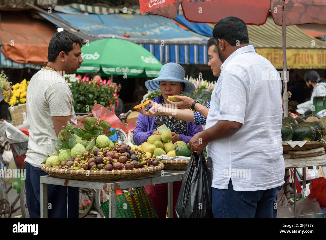 A traditional food vendor selling their produce on the streets of the ...