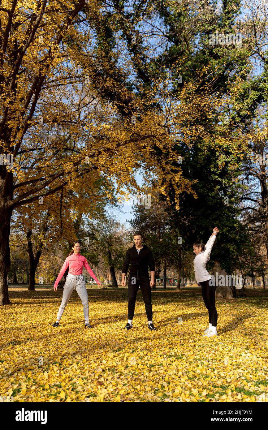 Three amazing and attractive friends are preparing for their training ...