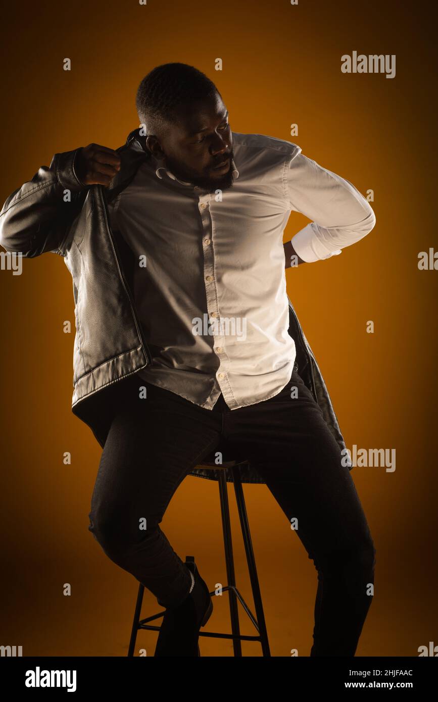 Boy putting on jacket hi-res stock photography and images - Alamy