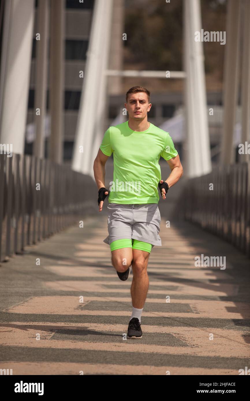 Men running towards camera hi-res stock photography and images - Alamy