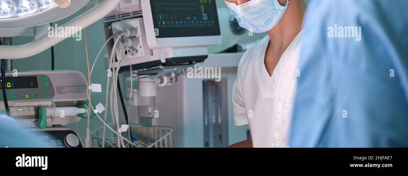 Surgery doctor operating a patient in surgical room. Healthcare and ...