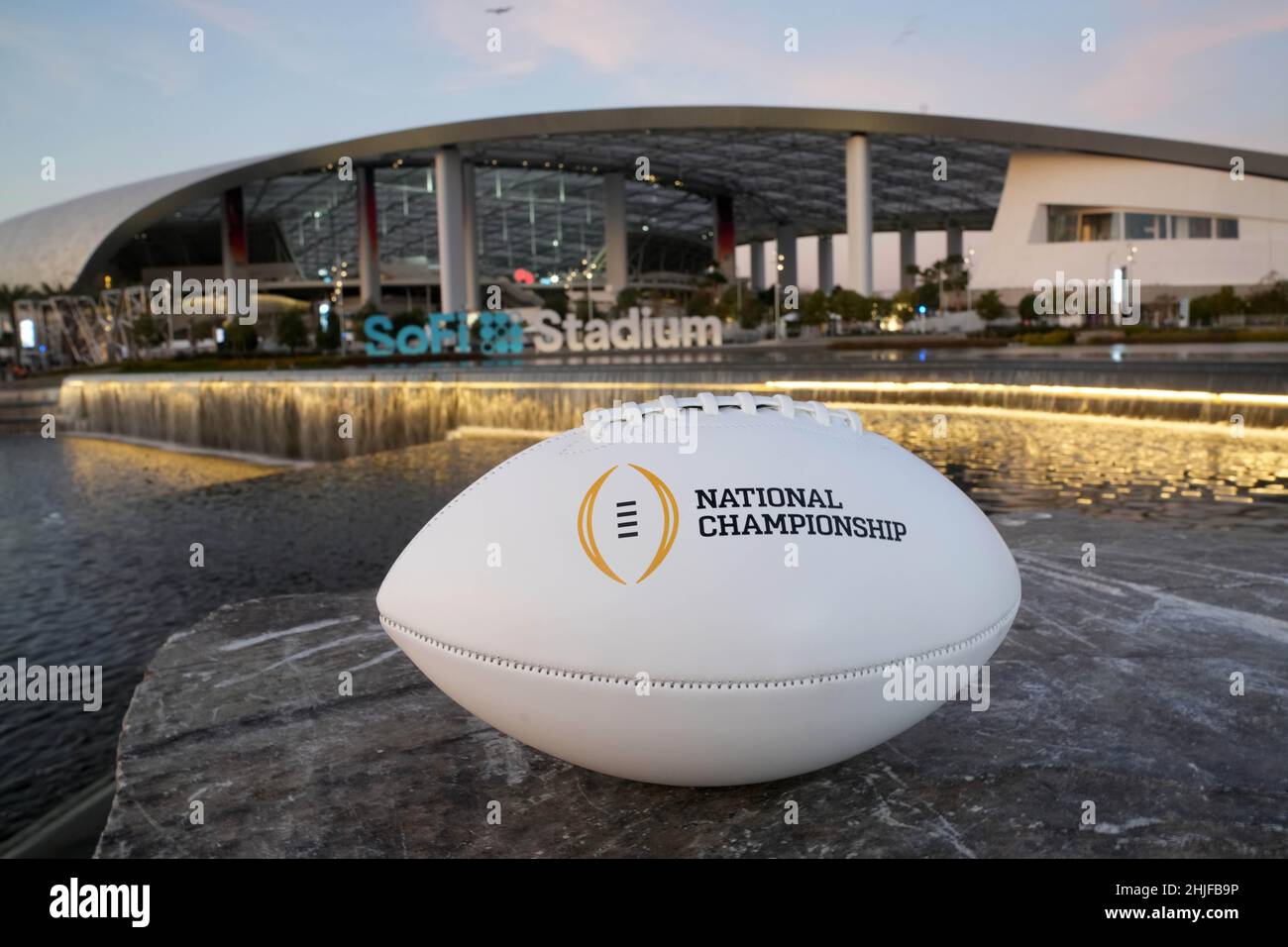 A football with the College Football Playoff national championship logo ...
