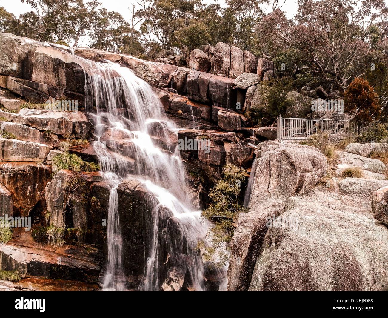 Mesmerizing view of waterfall with the natural stones and tress Stock ...
